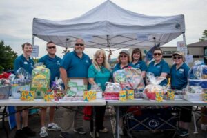 Community turns out for 28th annual Alumni Association flea market ...